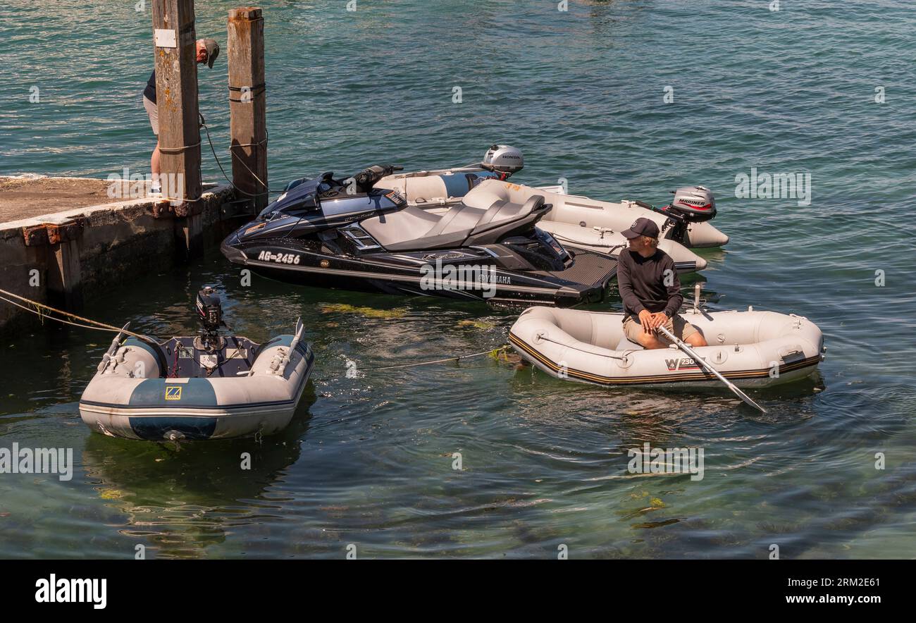 Herm Island, Channel Islands, UK. 11 June 2023. Dingies in the shallow ...