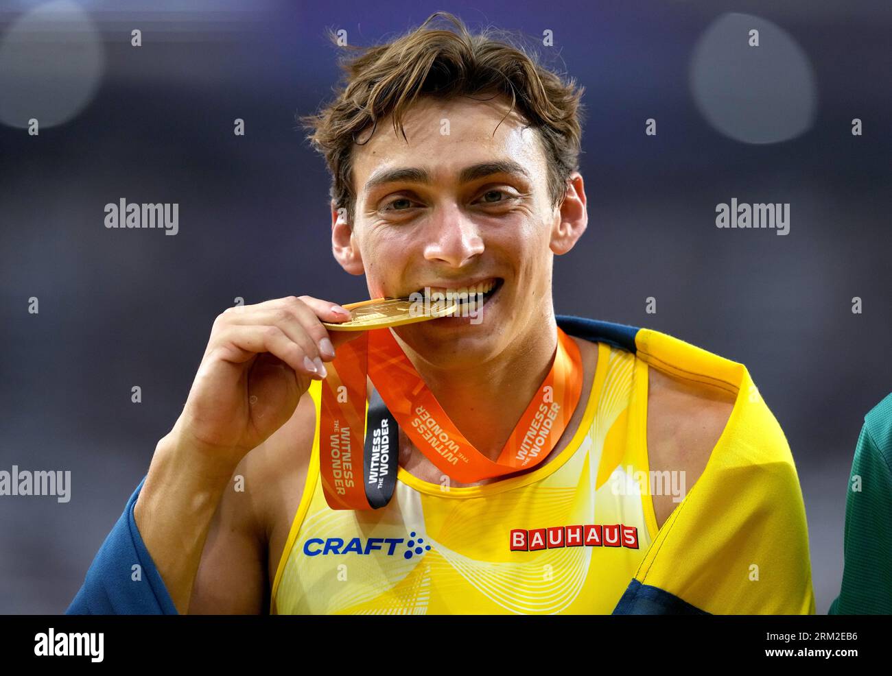 Sweden's Armand Duplantis celebrates with his gold medal after winning ...