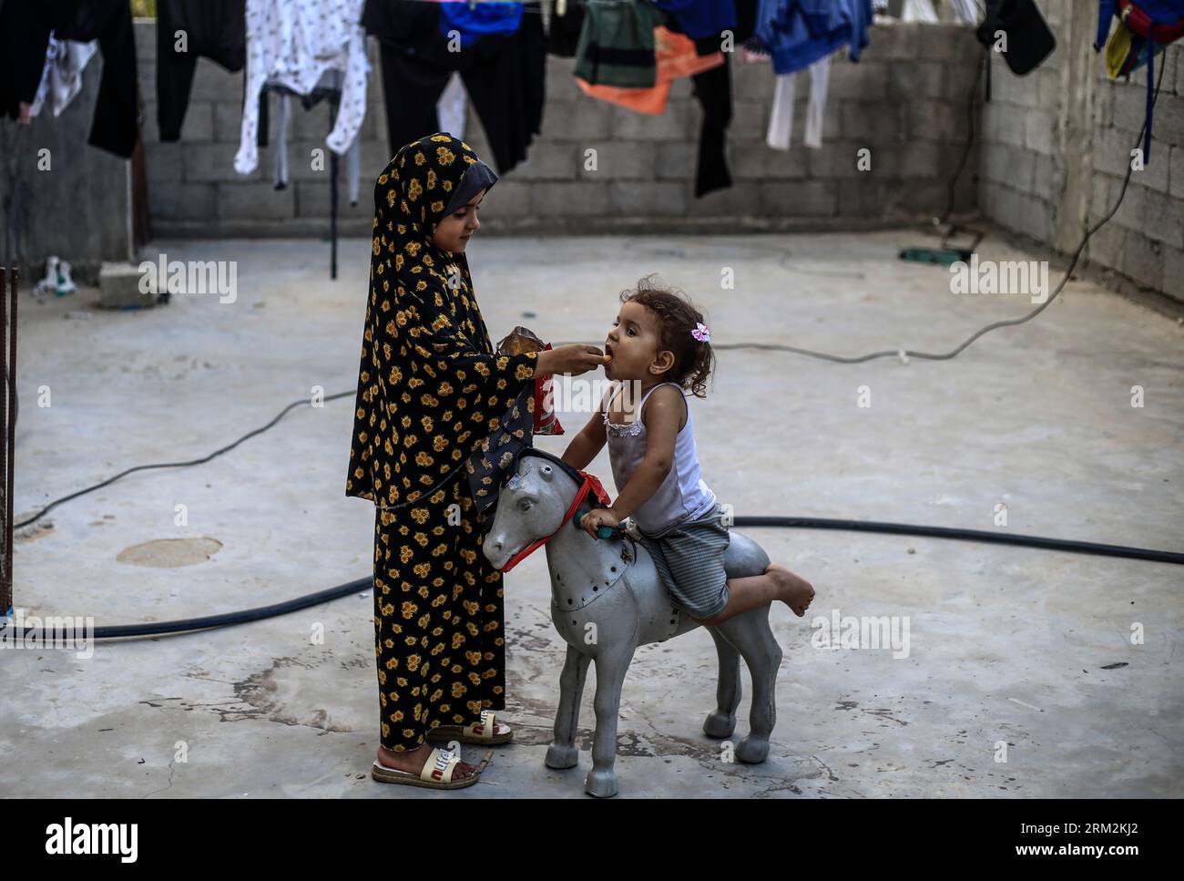 Palestine refugee children play inside their home in the Jabalia ...