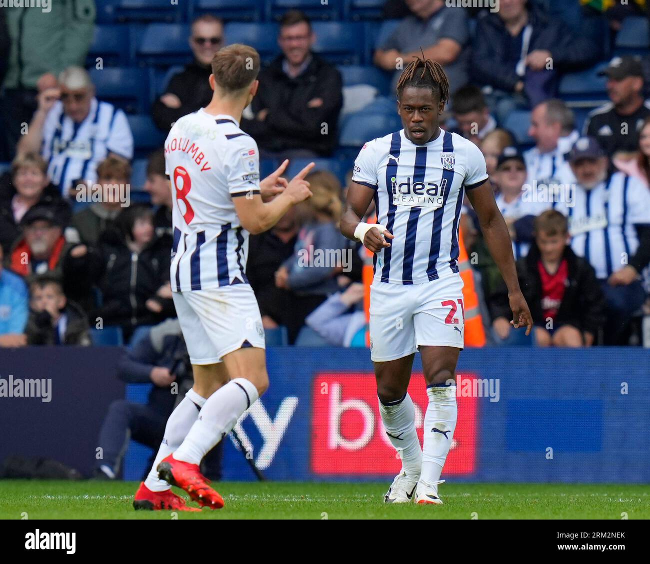 Jayson Molumby #8 of West Bromwich Albion celebrates with goal scorer ...