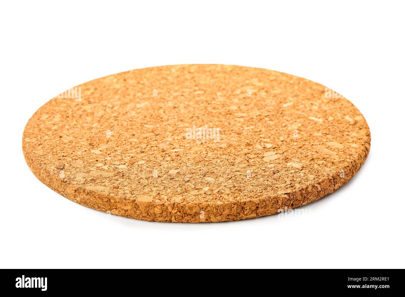 Round cork table coaster on white background Stock Photo - Alamy