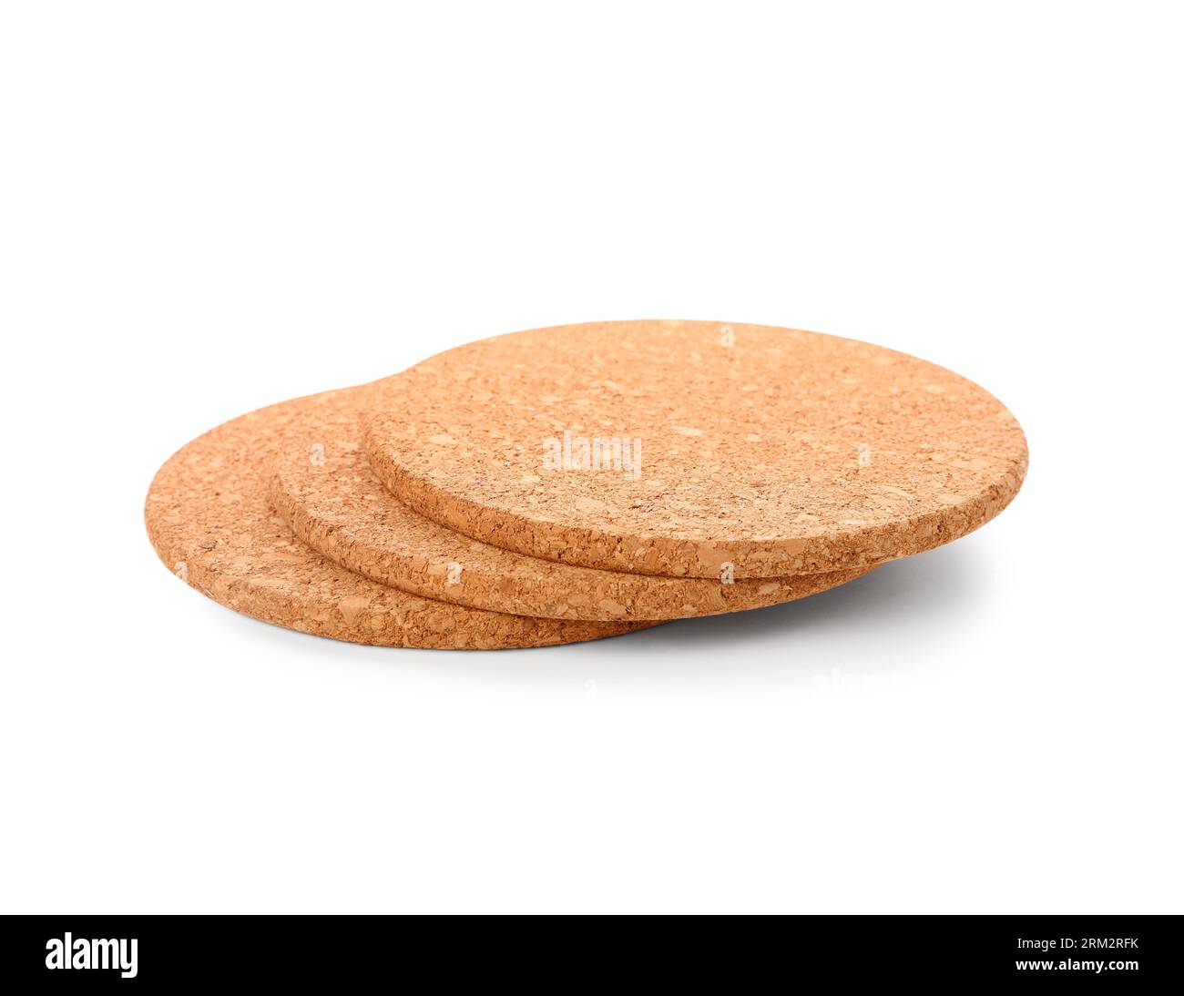 Round cork table coasters on white background Stock Photo - Alamy