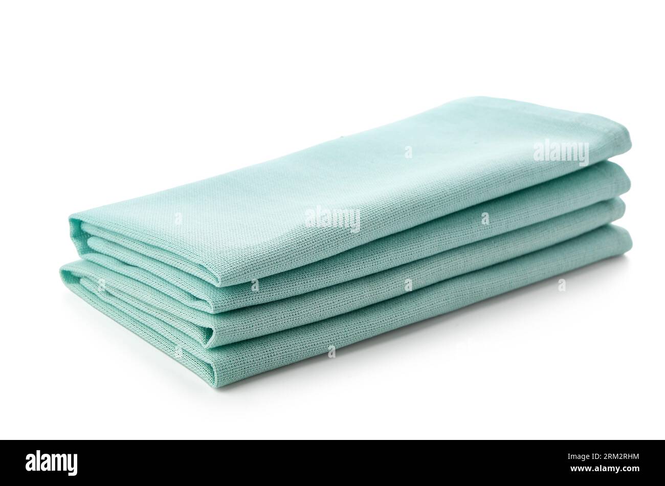 Folded clean napkins isolated on white background Stock Photo - Alamy