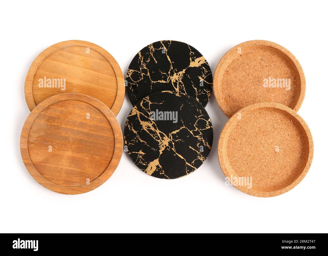 Set of table coasters and plates on white background Stock Photo - Alamy