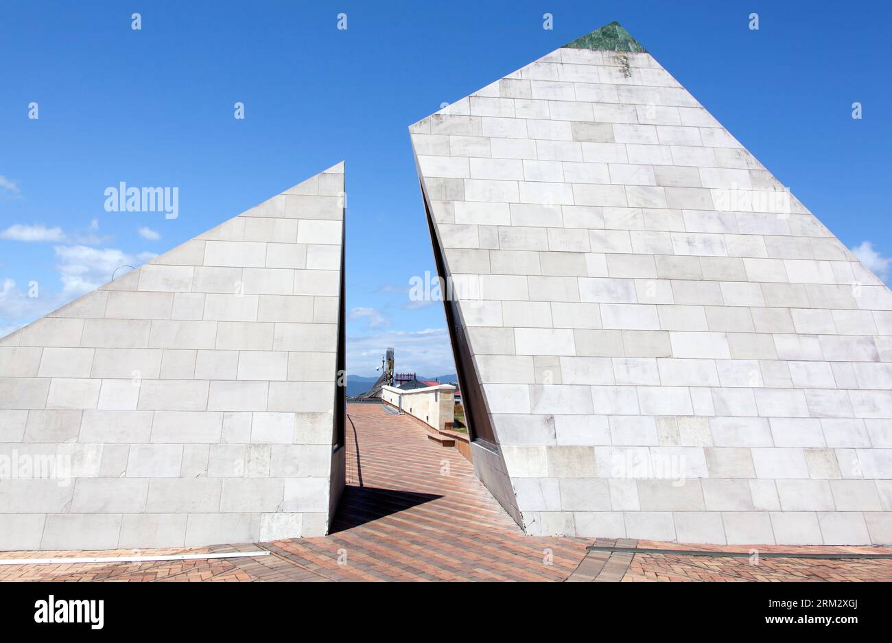 The modern pyramid like entrance to the pedestrian bridge in Wellington ...
