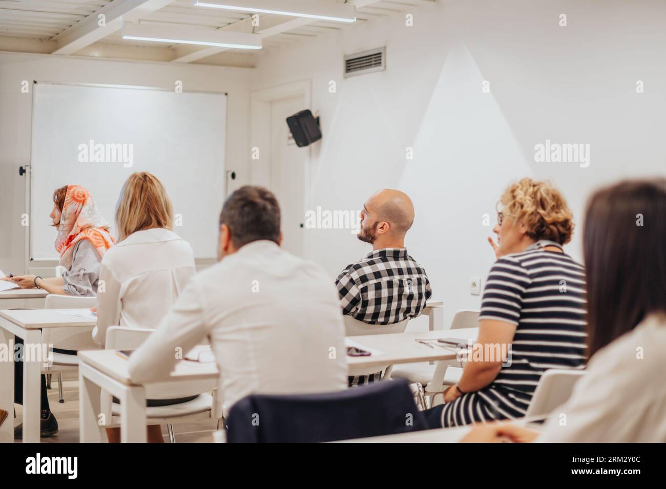 Group of students attending business classes in the classroom Stock ...