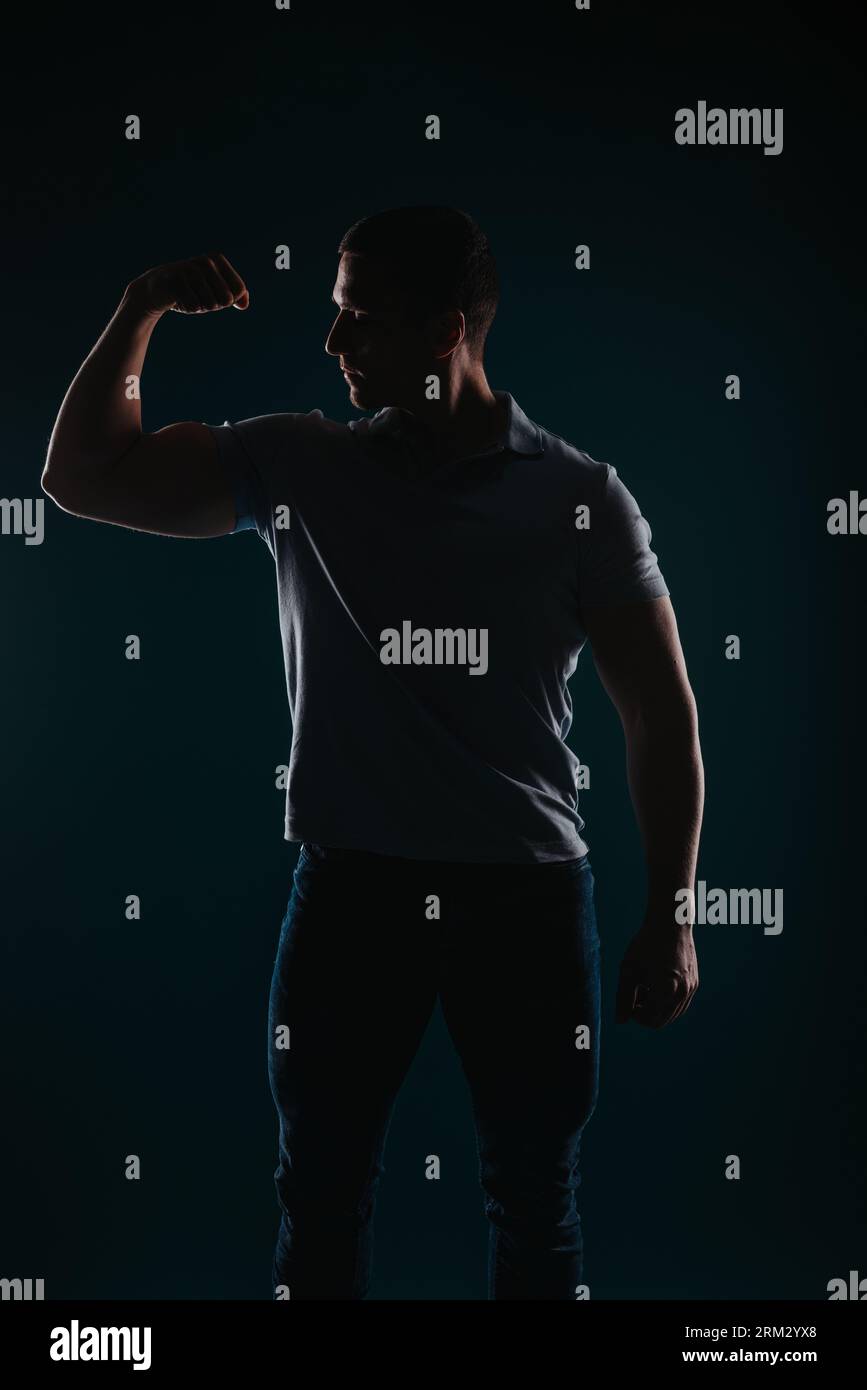 Silhouette strong well built man hi-res stock photography and images ...
