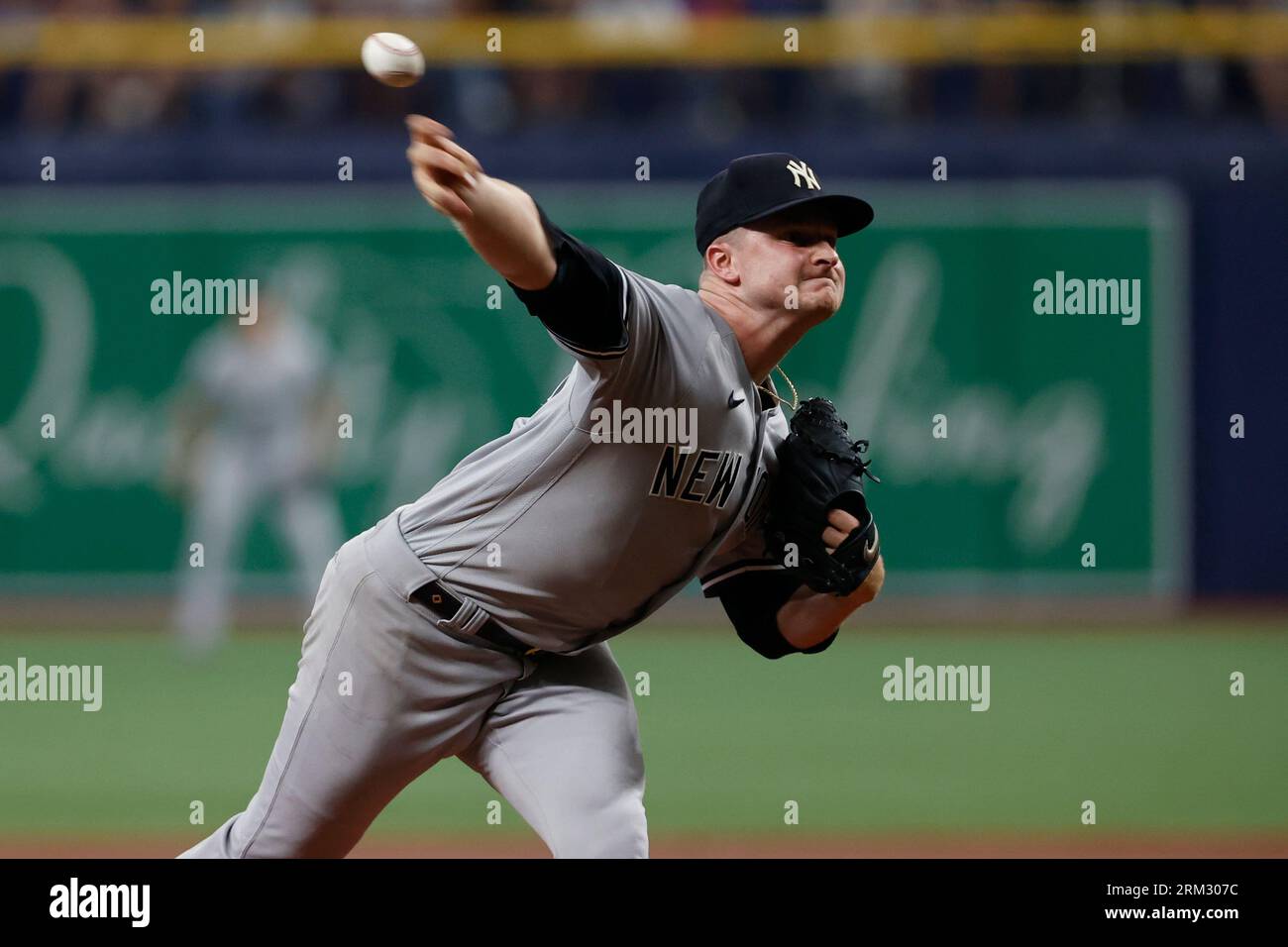 New York Yankees pitcher Clarke Schmidt throws to a Tampa Bay Rays ...