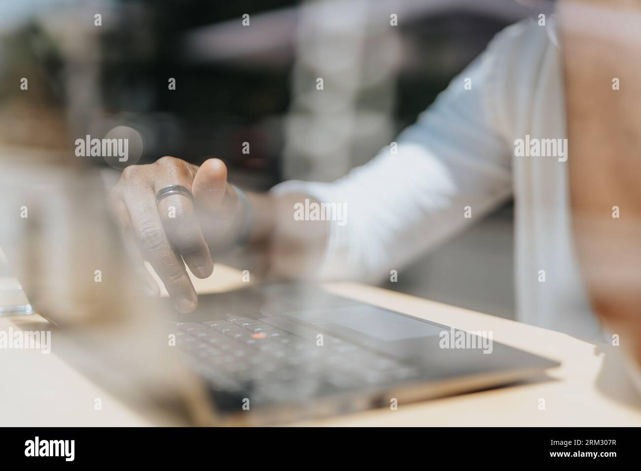 Close up photo of black male business person typing on lap top Stock ...