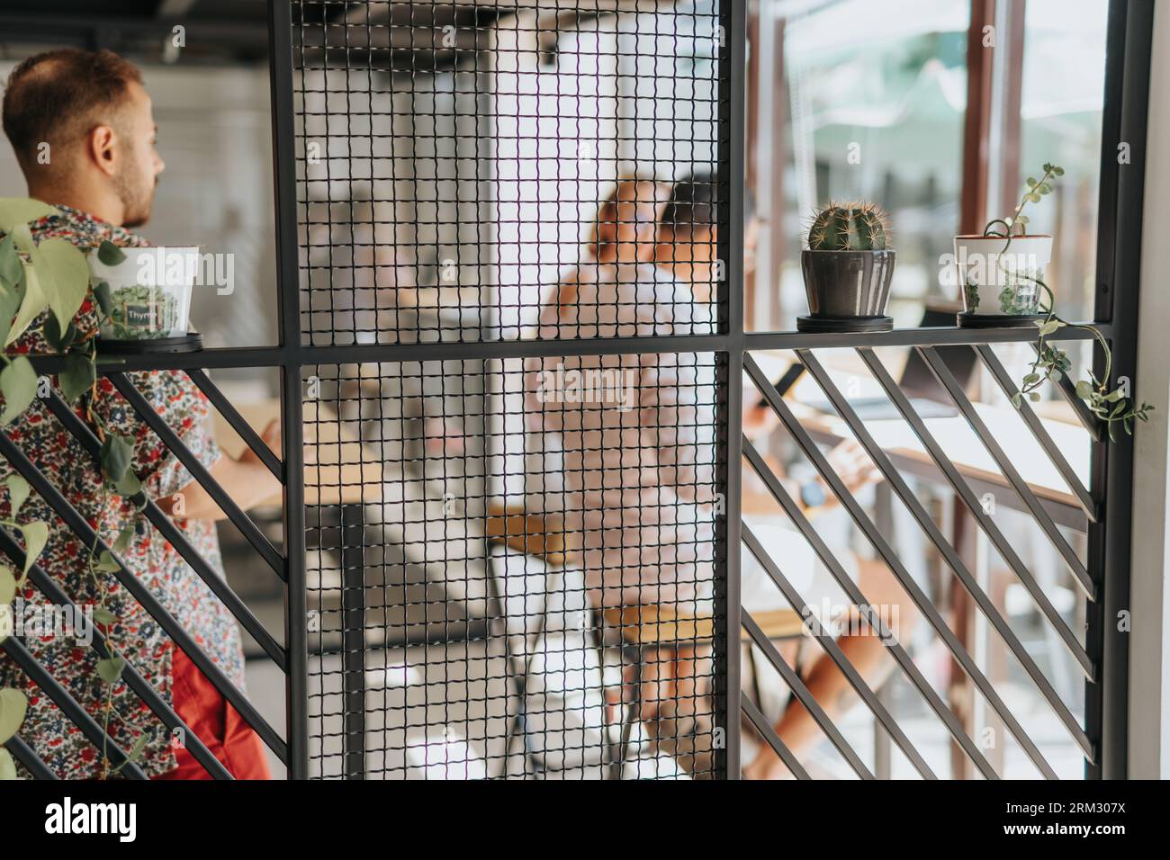 A Diverse Group Of Businesspeople Collaborating In A Corporate Office Analyzing Statistics