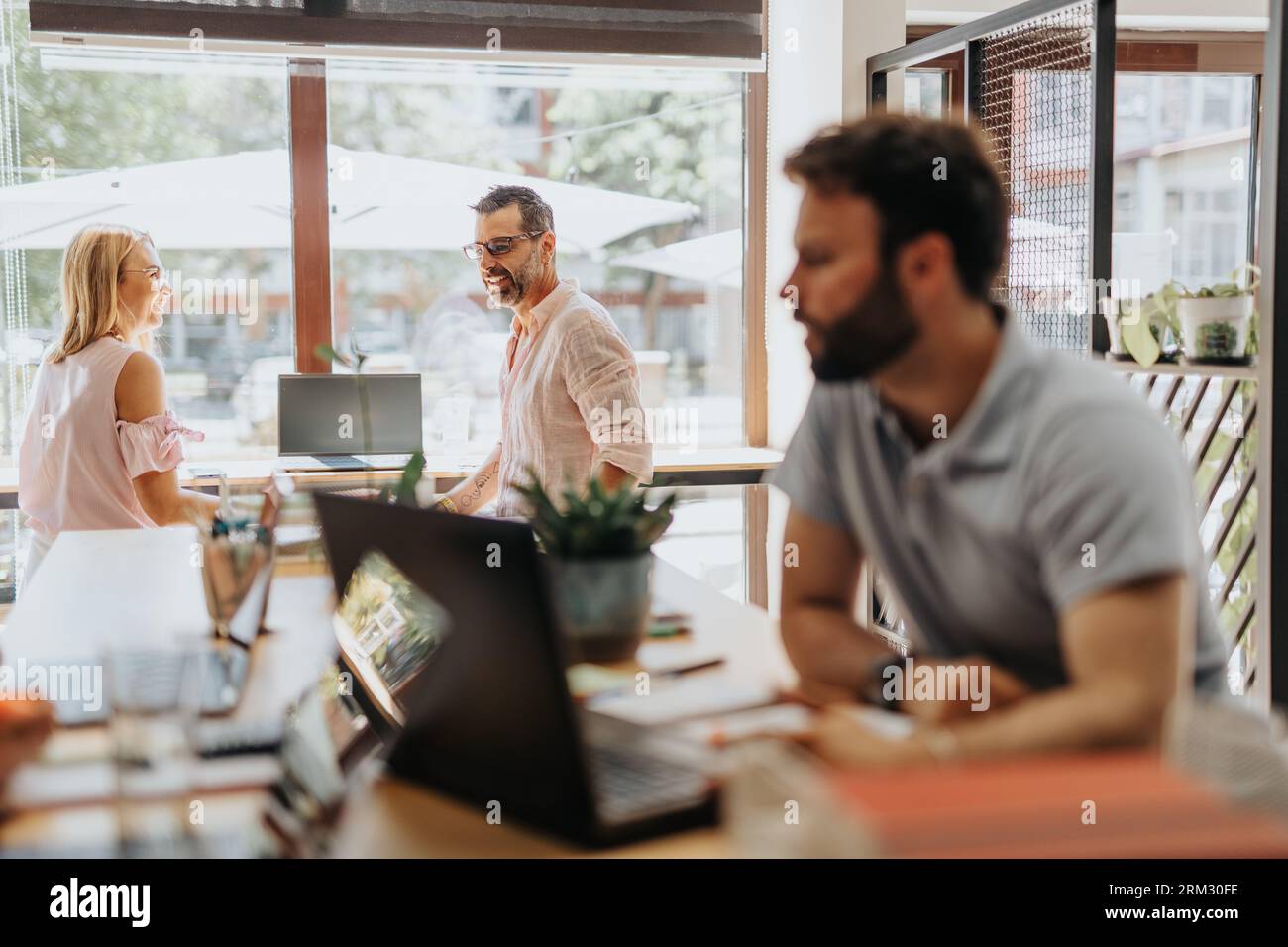 Diverse Business Professionals Collaborate For Better Results Discussing Ideas Analyzing