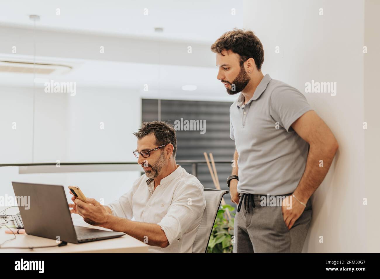 Colleagues analyze data, work on projects, and collaborate in an ...