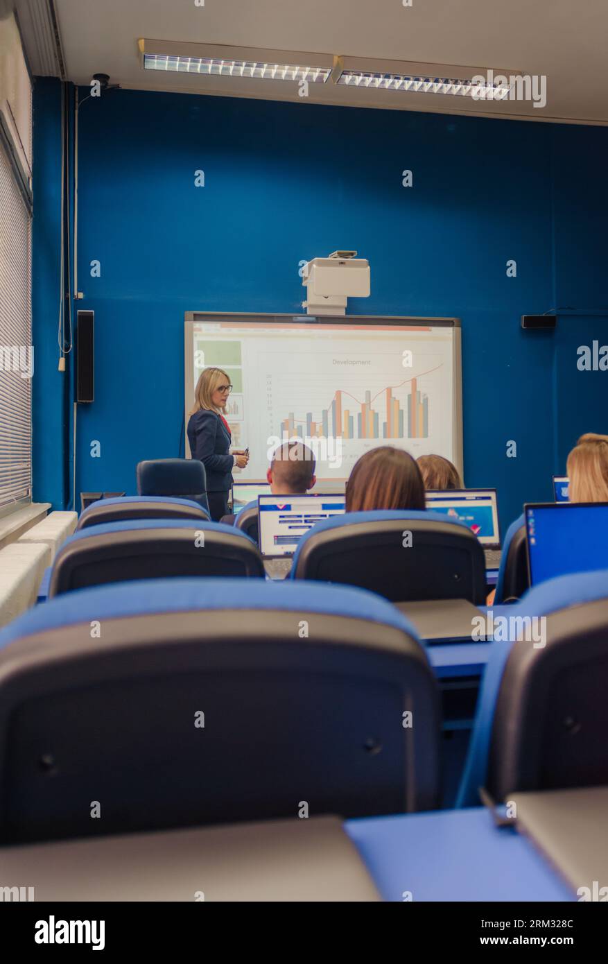 Focused, talented students attending classes at university. College ...