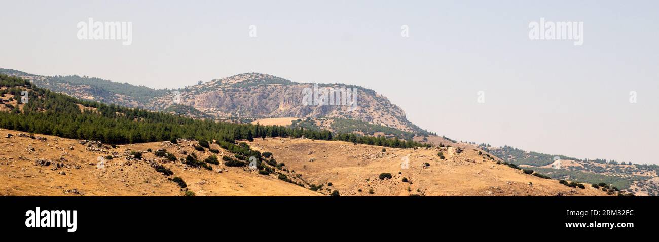 Turkish mountains and green forest panorama, stone hills and sand Stock ...