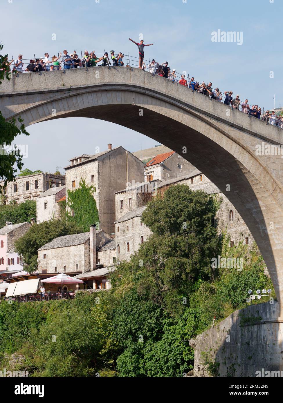 Someone prepares to jump from Stari Most (Old Bridge) This is a rite of ...