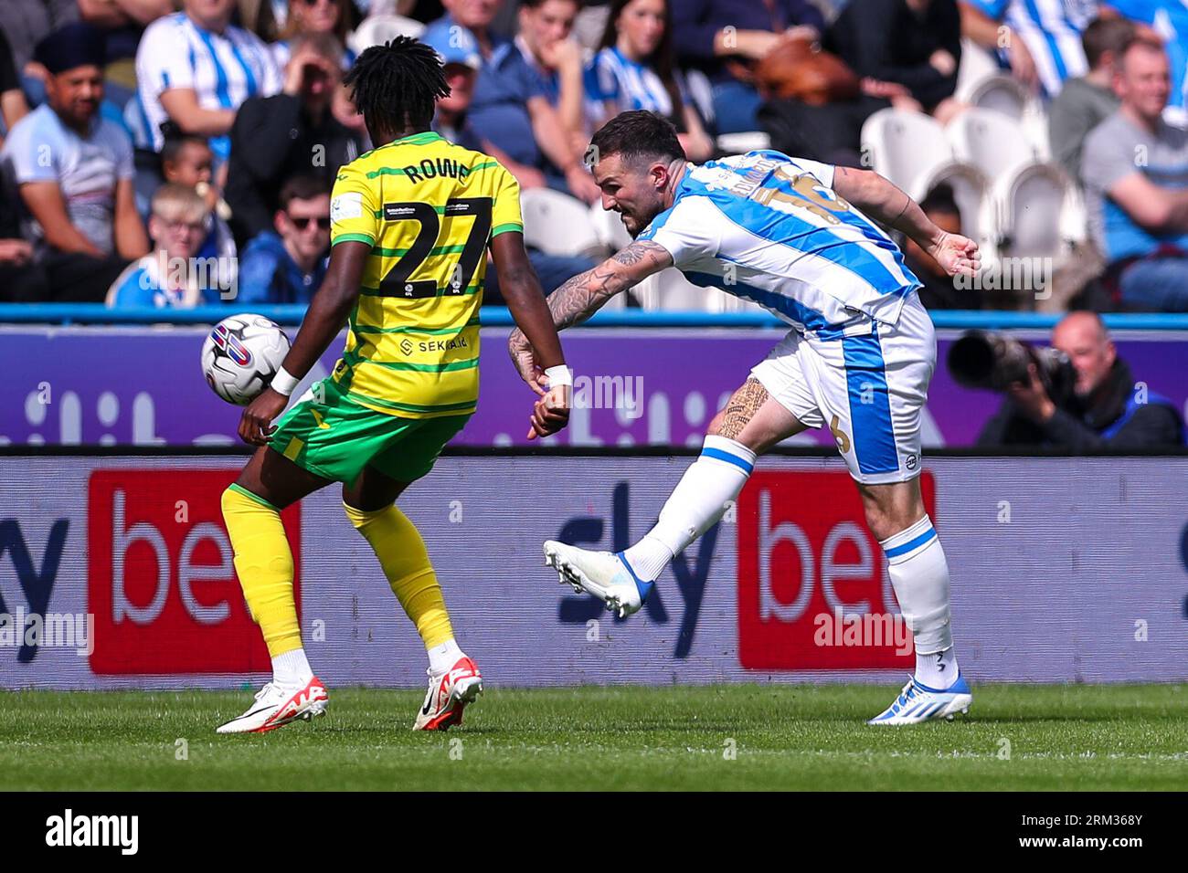 Tom Edwards of Huddersfield Town hoofs the ball downfield during the ...