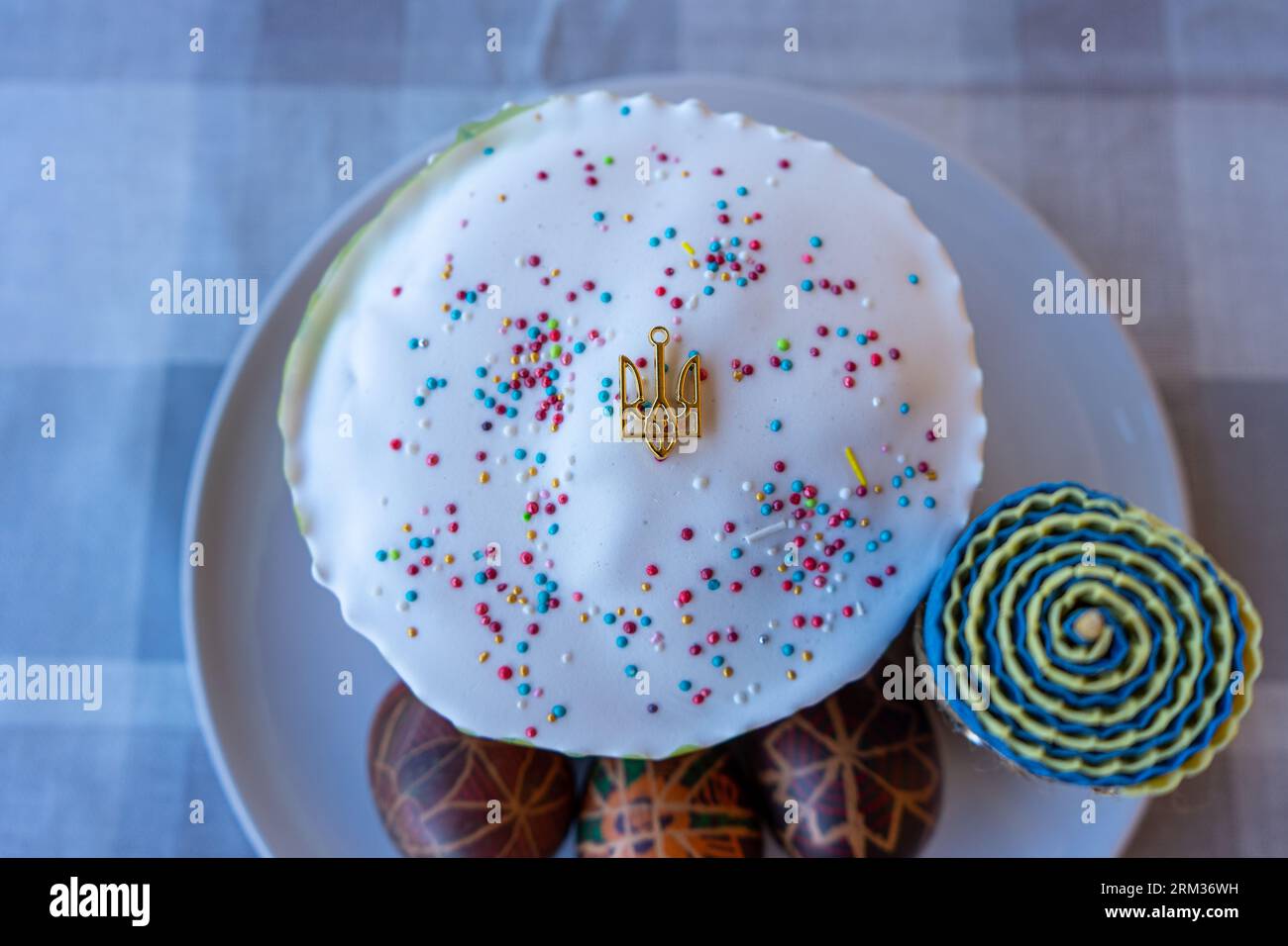 Traditional Ukrainian Easter cake (paska) with eggs (pysanky) and ...