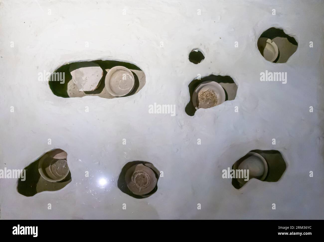 Snake bowls. Snake sacrifices bowls - containers placed in holes. Late ...