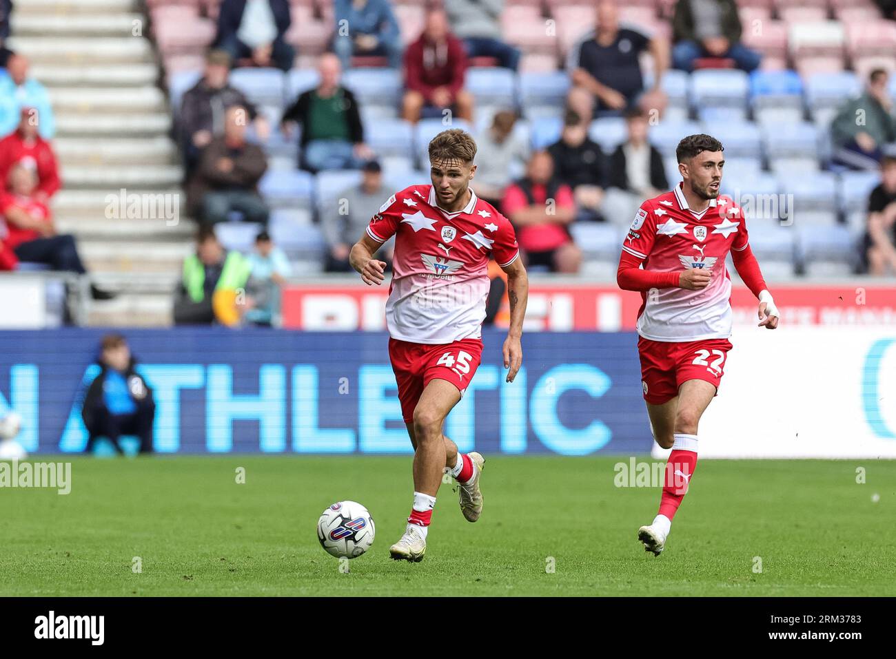 John Mcatee #45 of Barnsley breaks with the ball during the Sky Bet ...