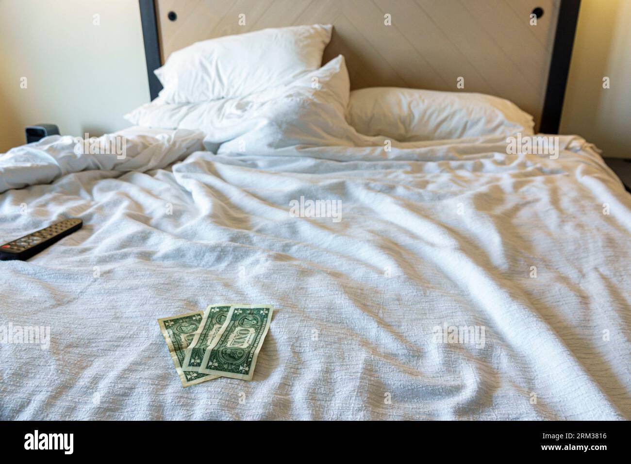 Guest room bed money housekeeping tip hi-res stock photography and ...