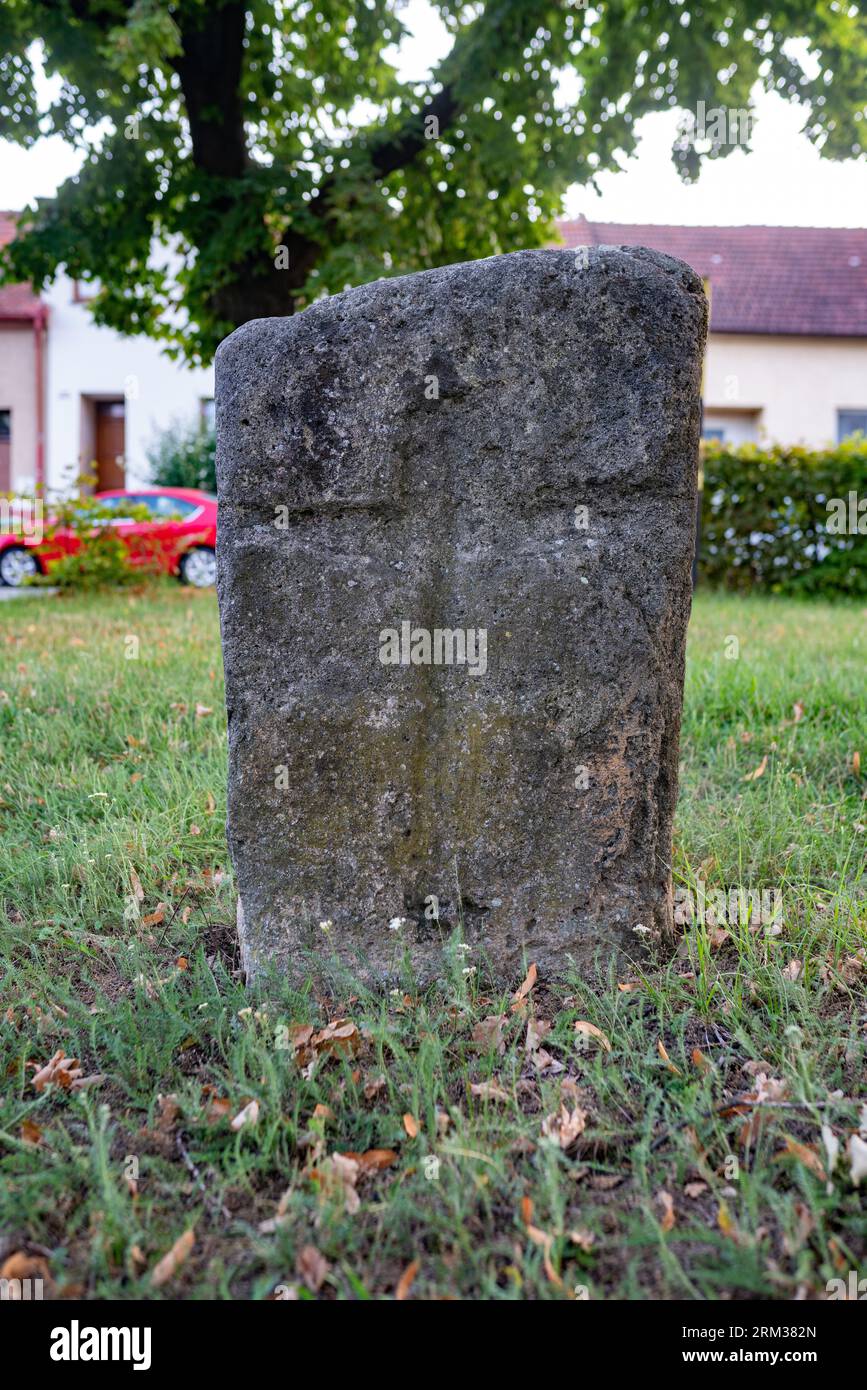 Cross stone, a simple 16th century monument, at a location of a former ...