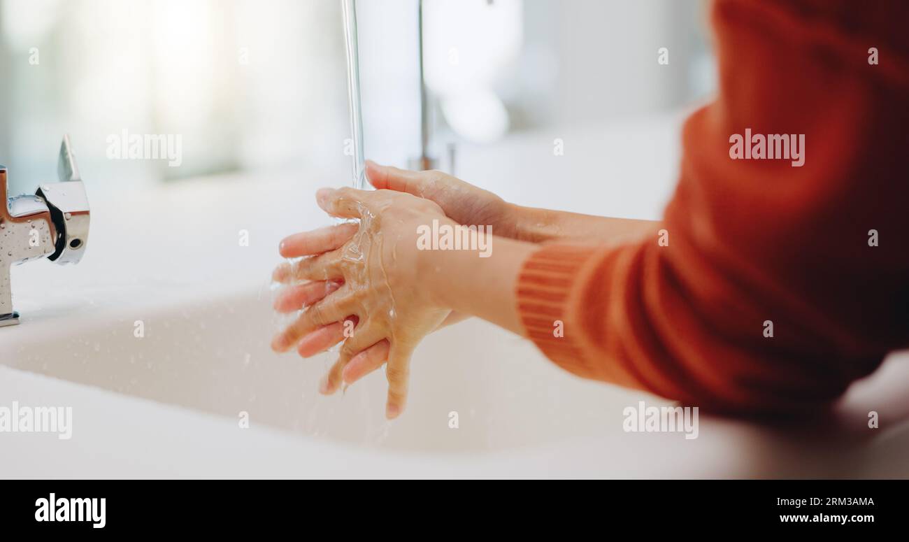 Water, washing hands and cleaning at sink in bathroom for hygiene ...