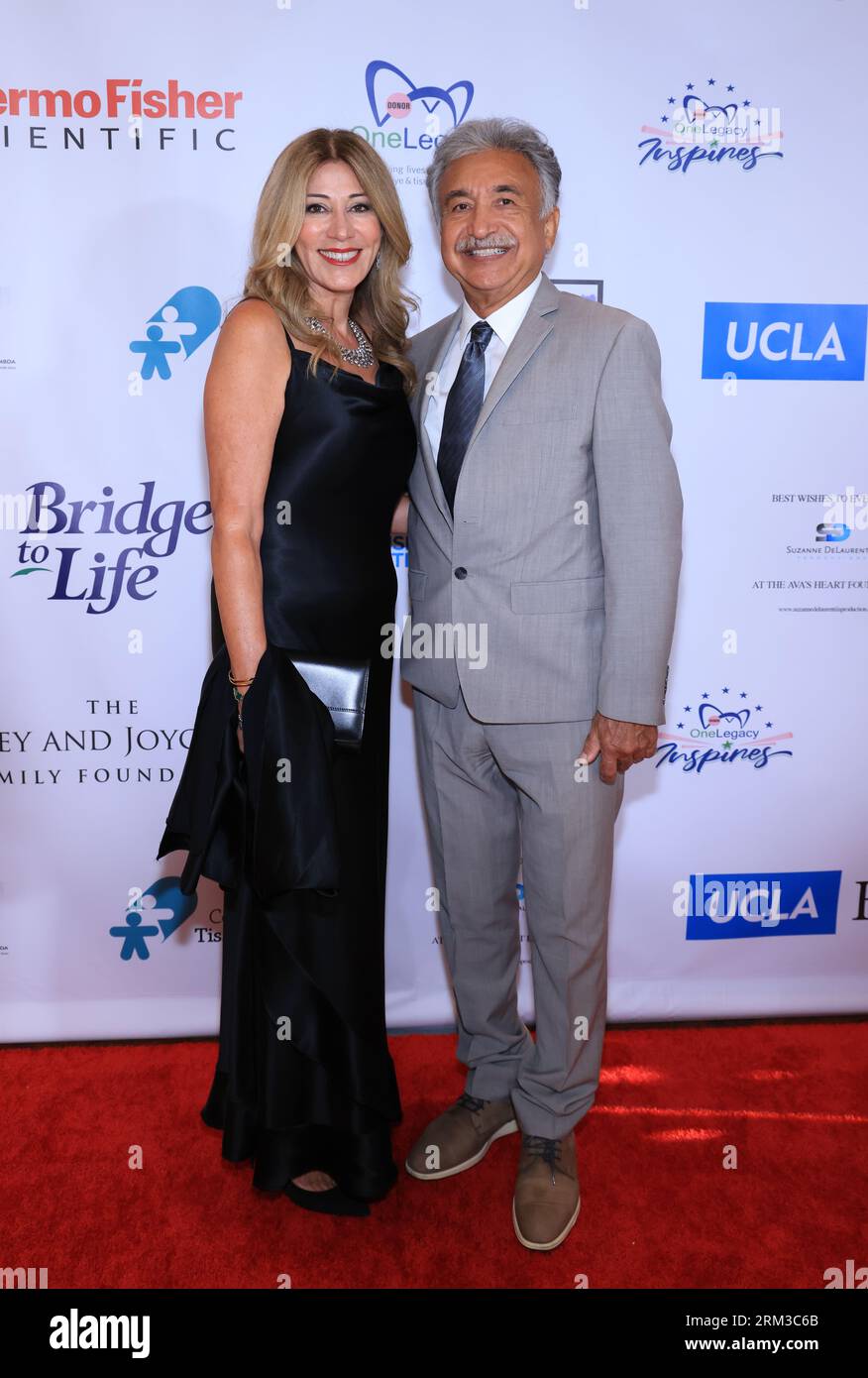 Los Angeles, California, USA. 24th August, 2023. Mona Shibhan and Hamid Shidban, MD (transplant ...