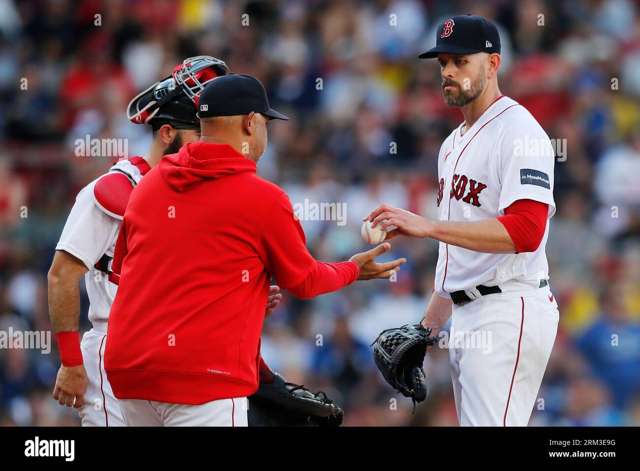 Boston Red Sox manager Alex Cora, front left, relieves starting pitcher ...