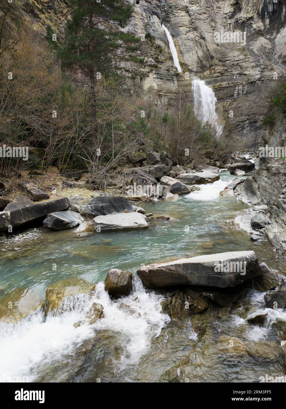 Sorrosal waterfall in Broto, in the Aragonese Pyrenees. Vertical shot ...