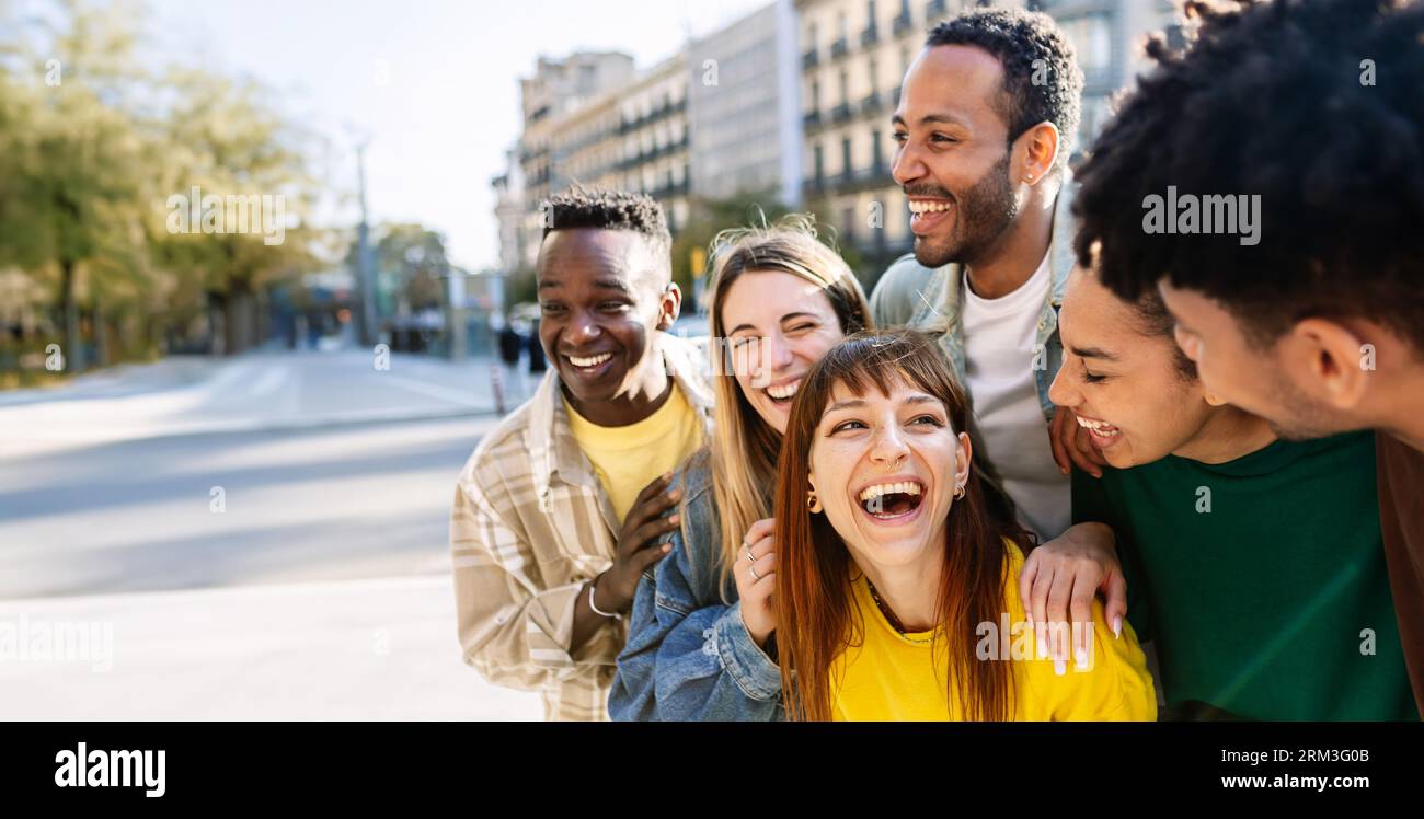 Multiracial group young students embracing hi-res stock photography and ...