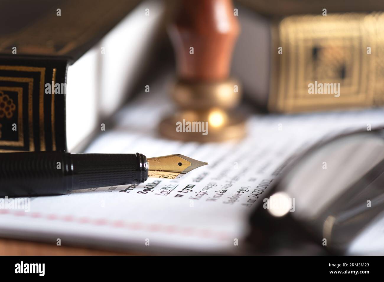 Law, notary background theme. Fountain pen and documents on desk Stock ...