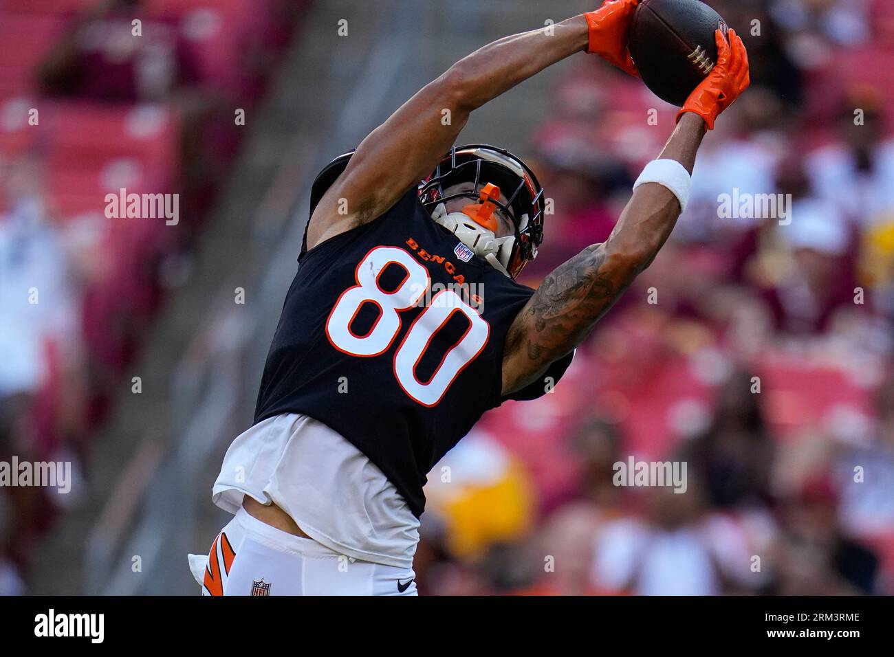 Cincinnati Bengals wide receiver Andrei Iosivas (80) reaching up to ...