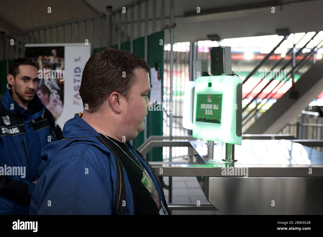 NIJMEGEN - Football fans have their faces scanned by a camera during a ...