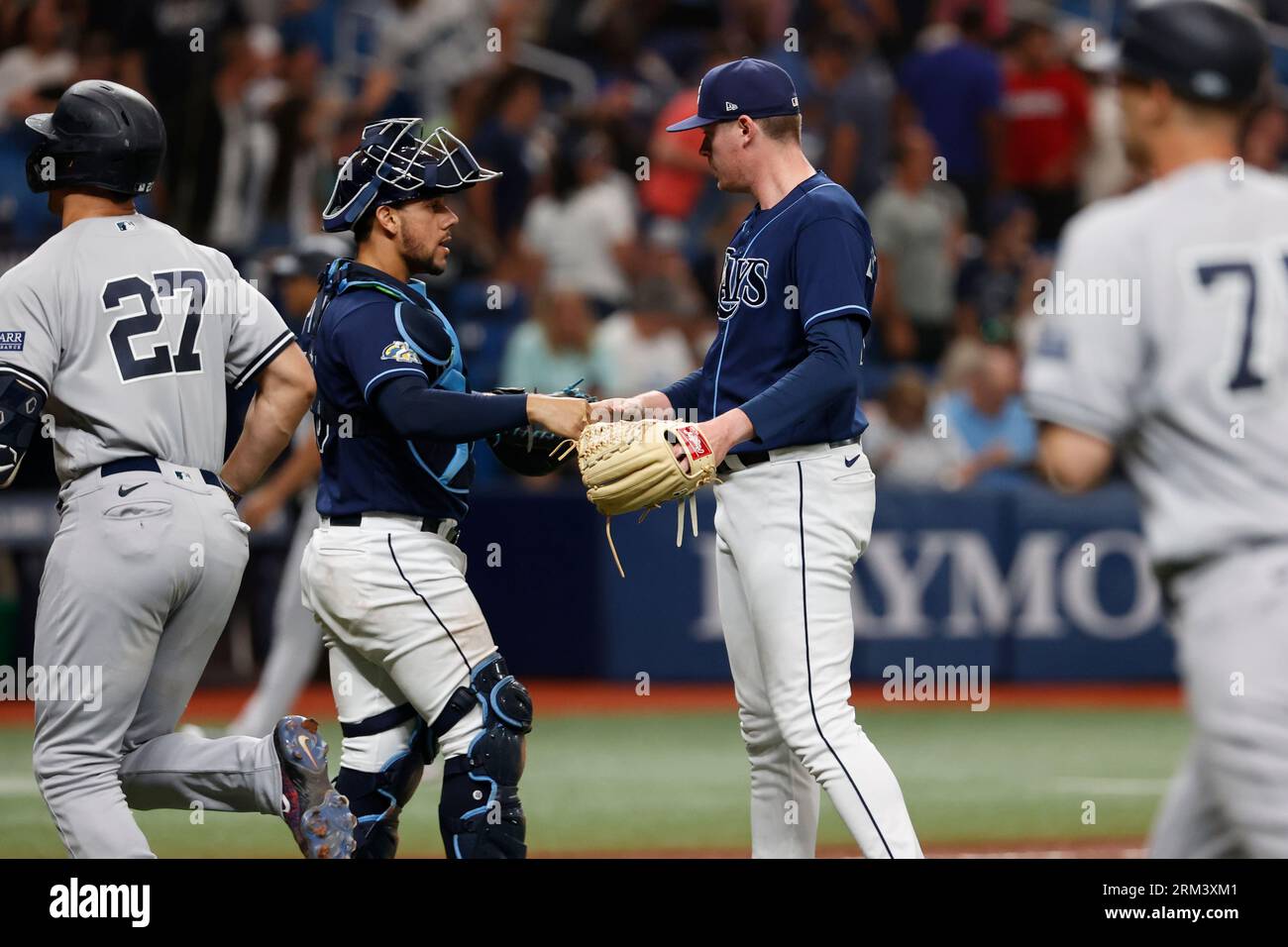 Tampa Bay Rays' pitcher Pete Fairbanks, right, celebrates with catcher ...