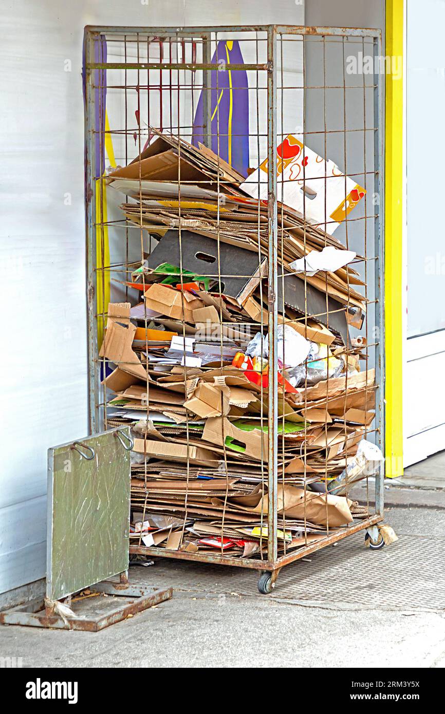 Empty cardboard package boxes and other paper material pile processed ...