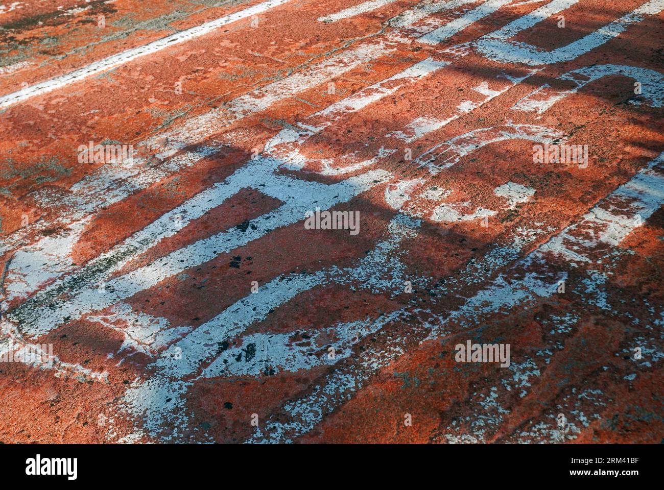 Faded road marking uk hi-res stock photography and images - Alamy