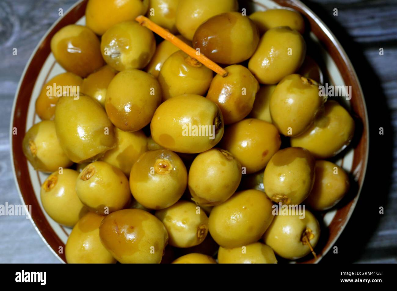 Yellow Barhi dates, botanically classified as Phoenix dactylifera ...