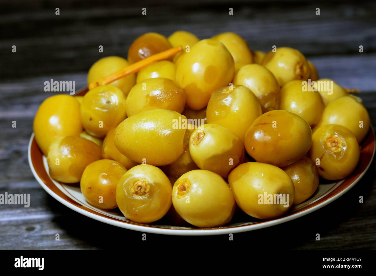 Yellow Barhi dates, botanically classified as Phoenix dactylifera ...