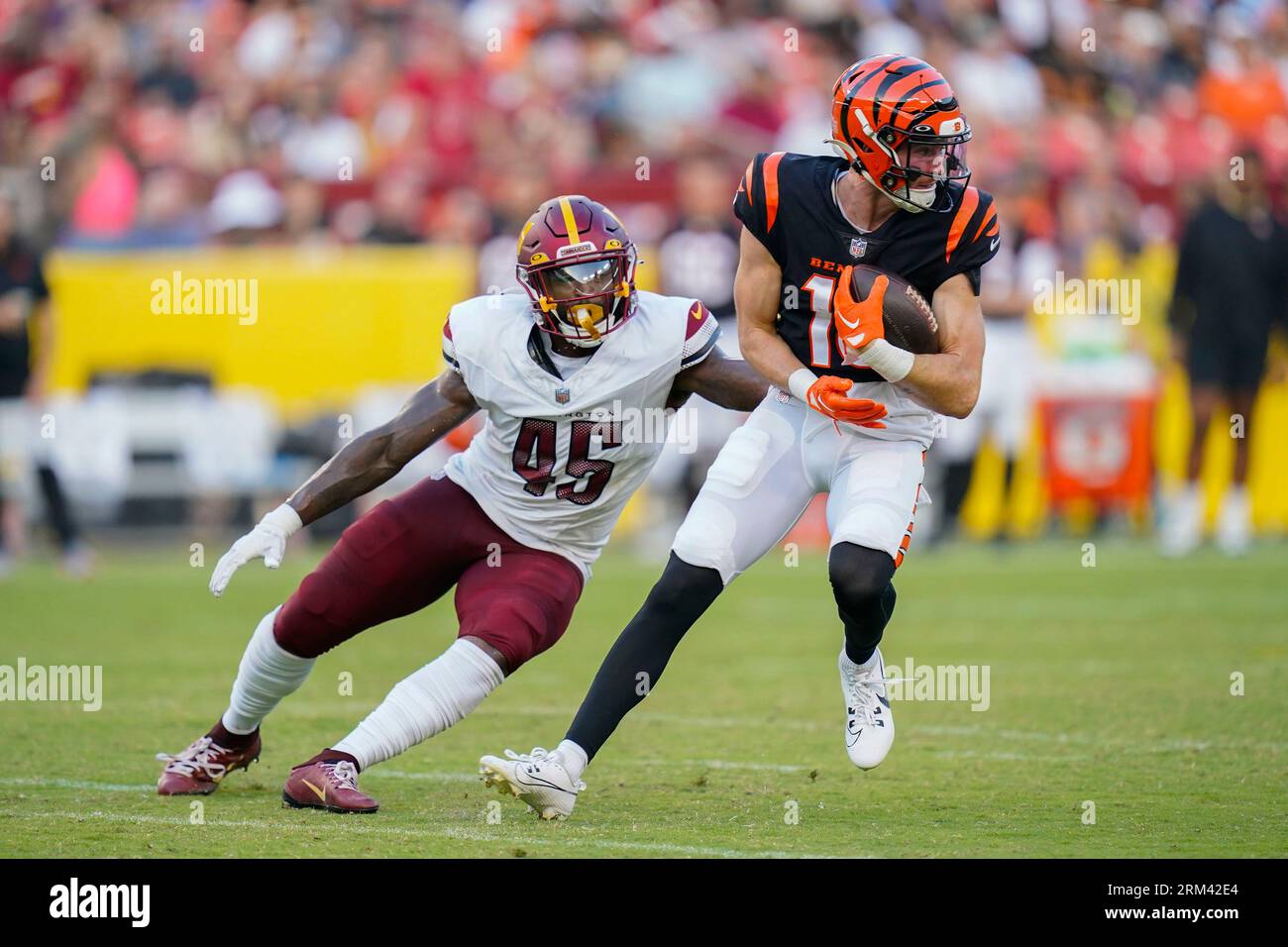 Cincinnati Bengals wide receiver Charlie Jones (15) trying to avoid ...