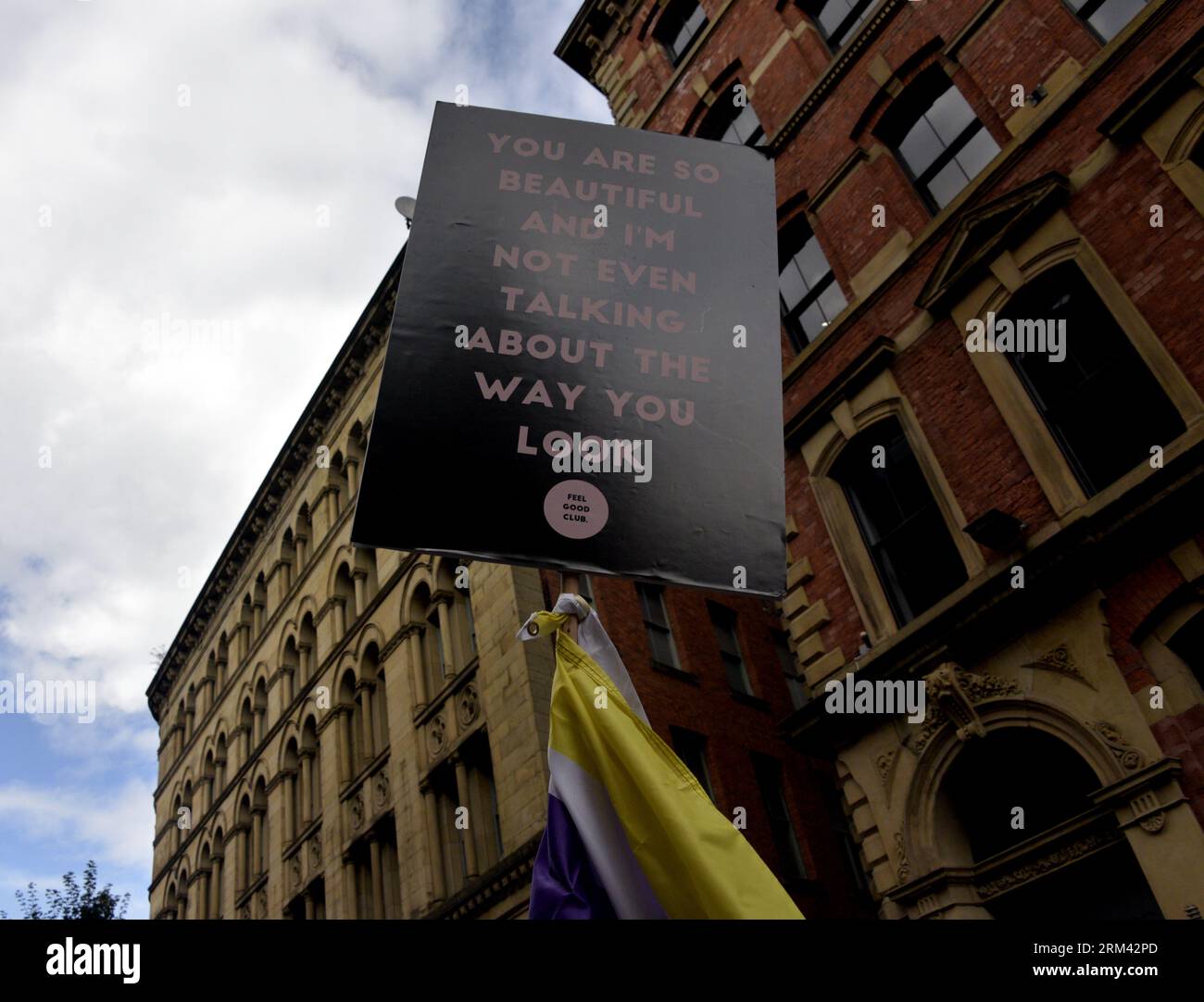 Placard reads:'You are so beautiful and I'm not even talking about the ...