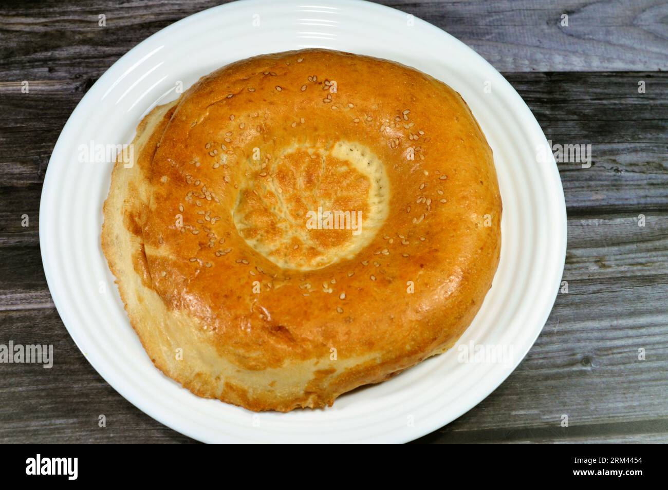 Tandyr nan Uzbek bread, a type of Central Asian bread, often decorated ...