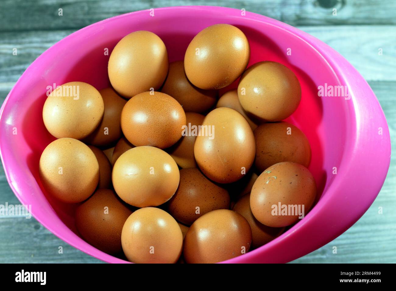 Pile of organic brown fresh and raw hen chicken eggs, stack of eggs ...
