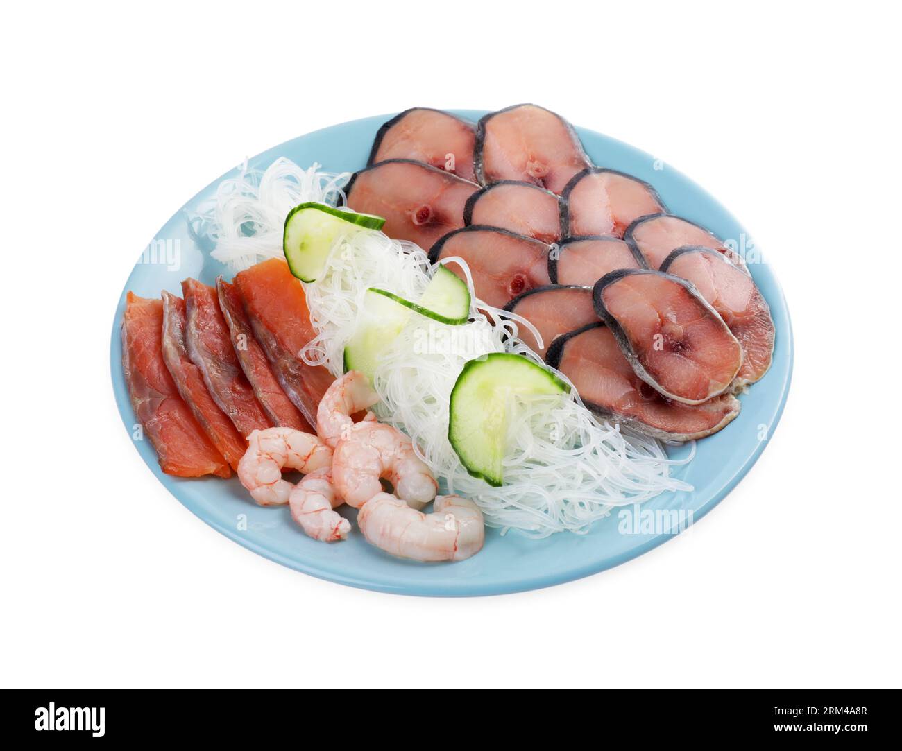 Set with raw salmon, mackerel slices and shrimps served with cucumber ...