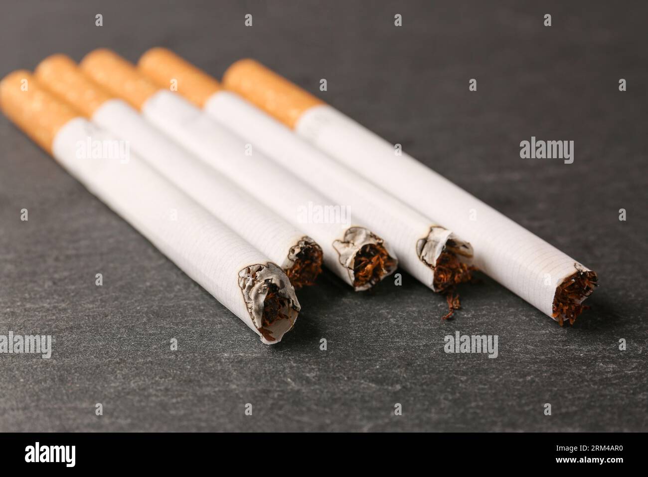 Burnt cigarettes hi-res stock photography and images - Alamy