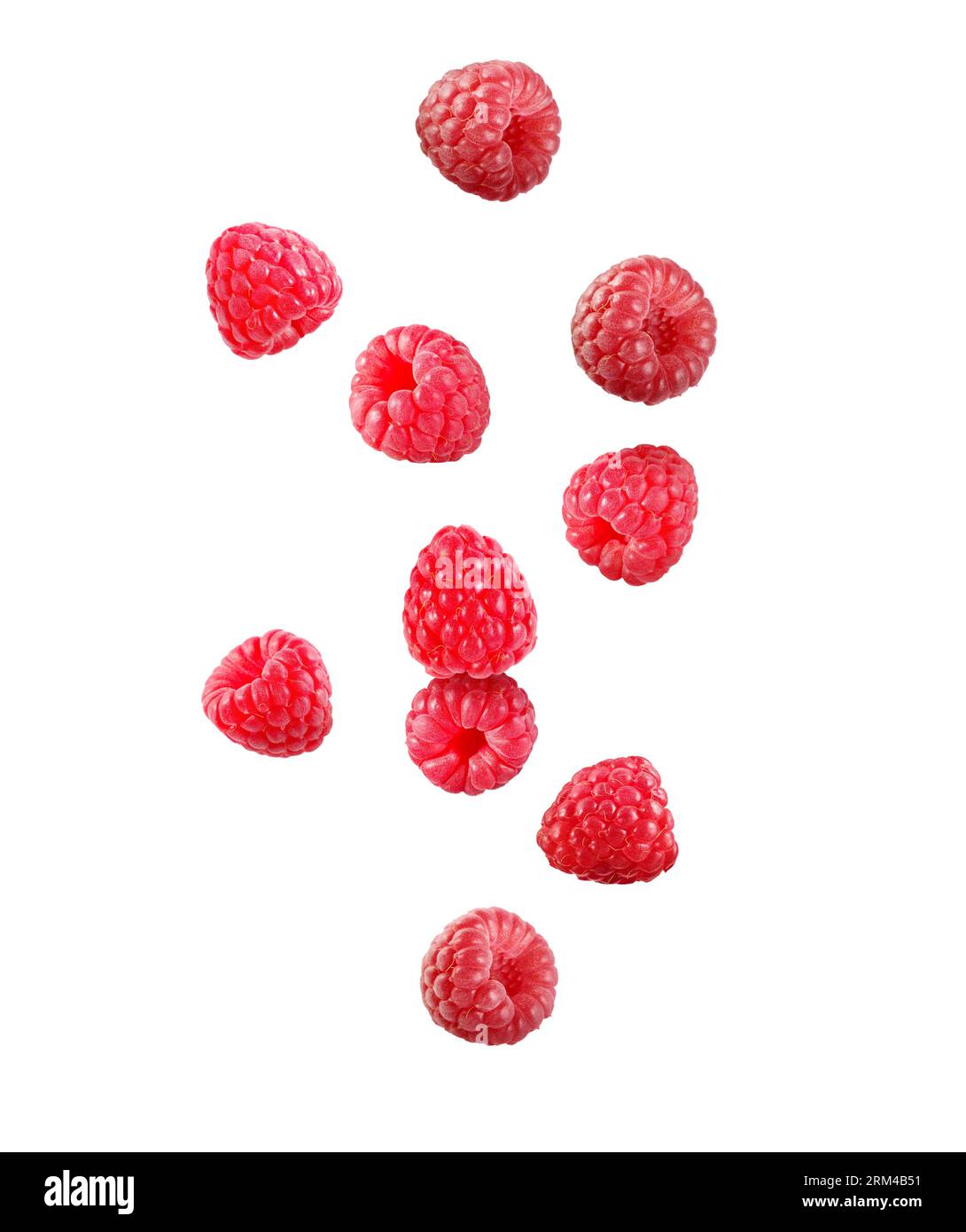 Many fresh ripe raspberries falling on white background Stock Photo - Alamy