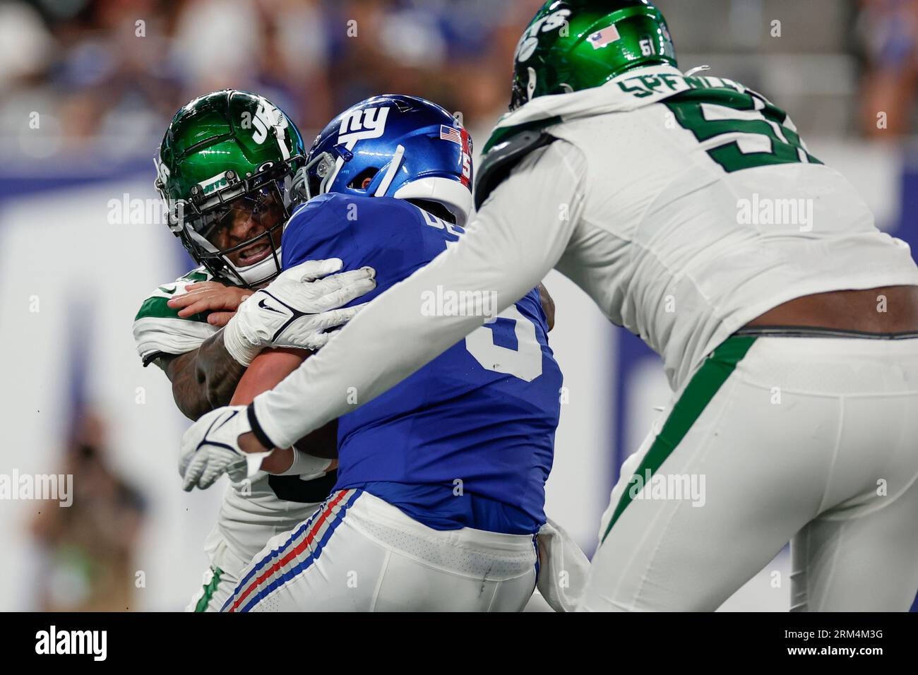 New York Jets defensive end Pita Taumoepenu, left, sacks New York ...