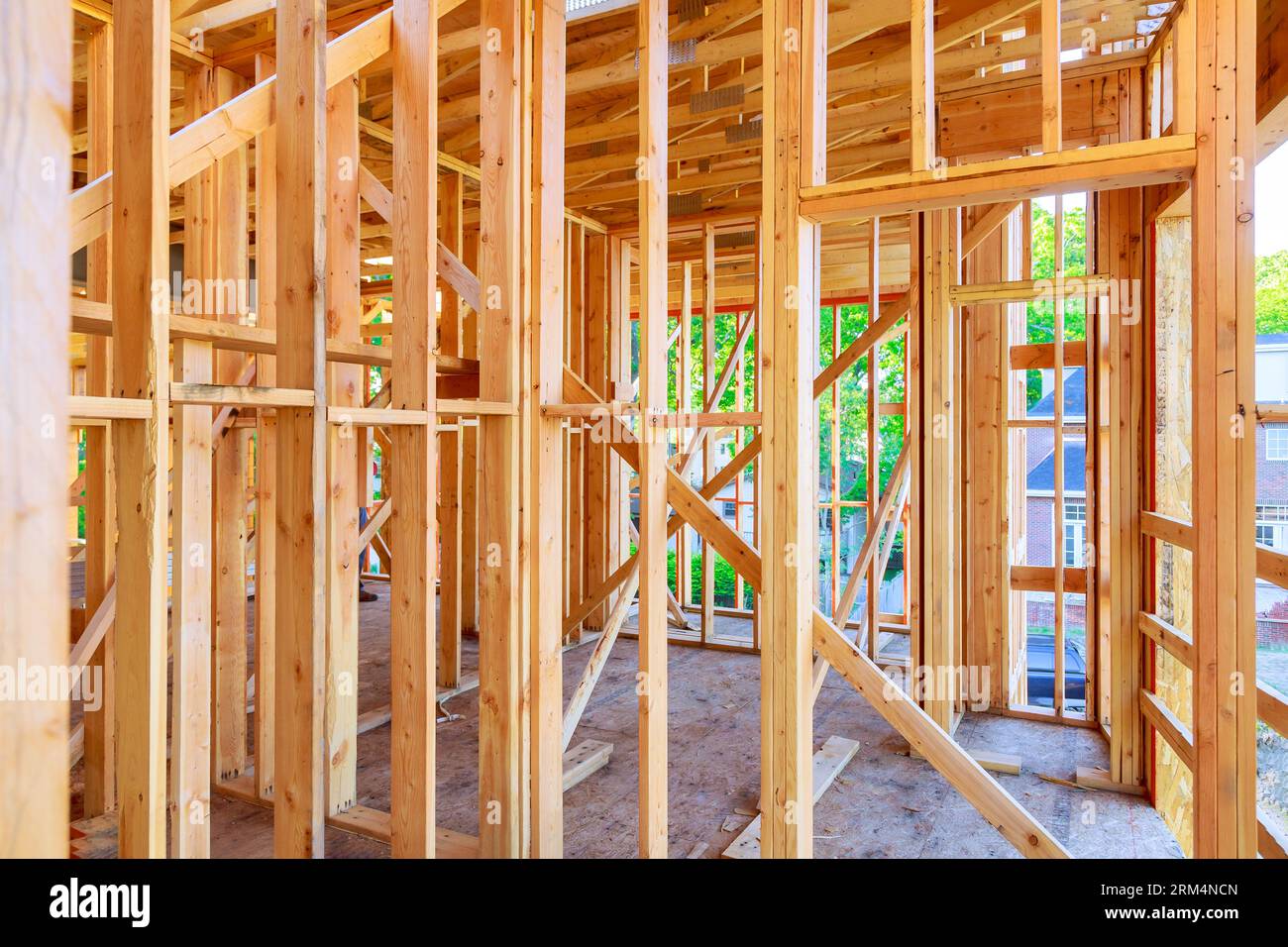 Work in progress interior view of new unfinished house with wooden ...
