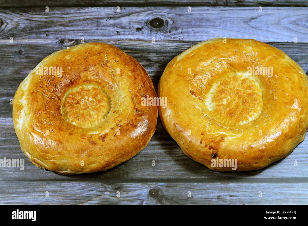 Tandyr nan Uzbek bread, a type of Central Asian bread, often decorated ...