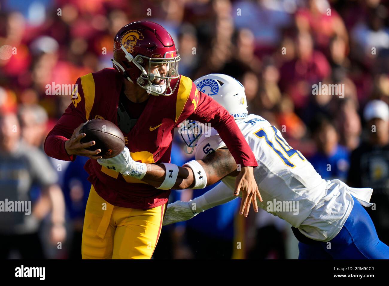San Jose State offensive lineman Anthony Pardue (74) tries to tackle ...