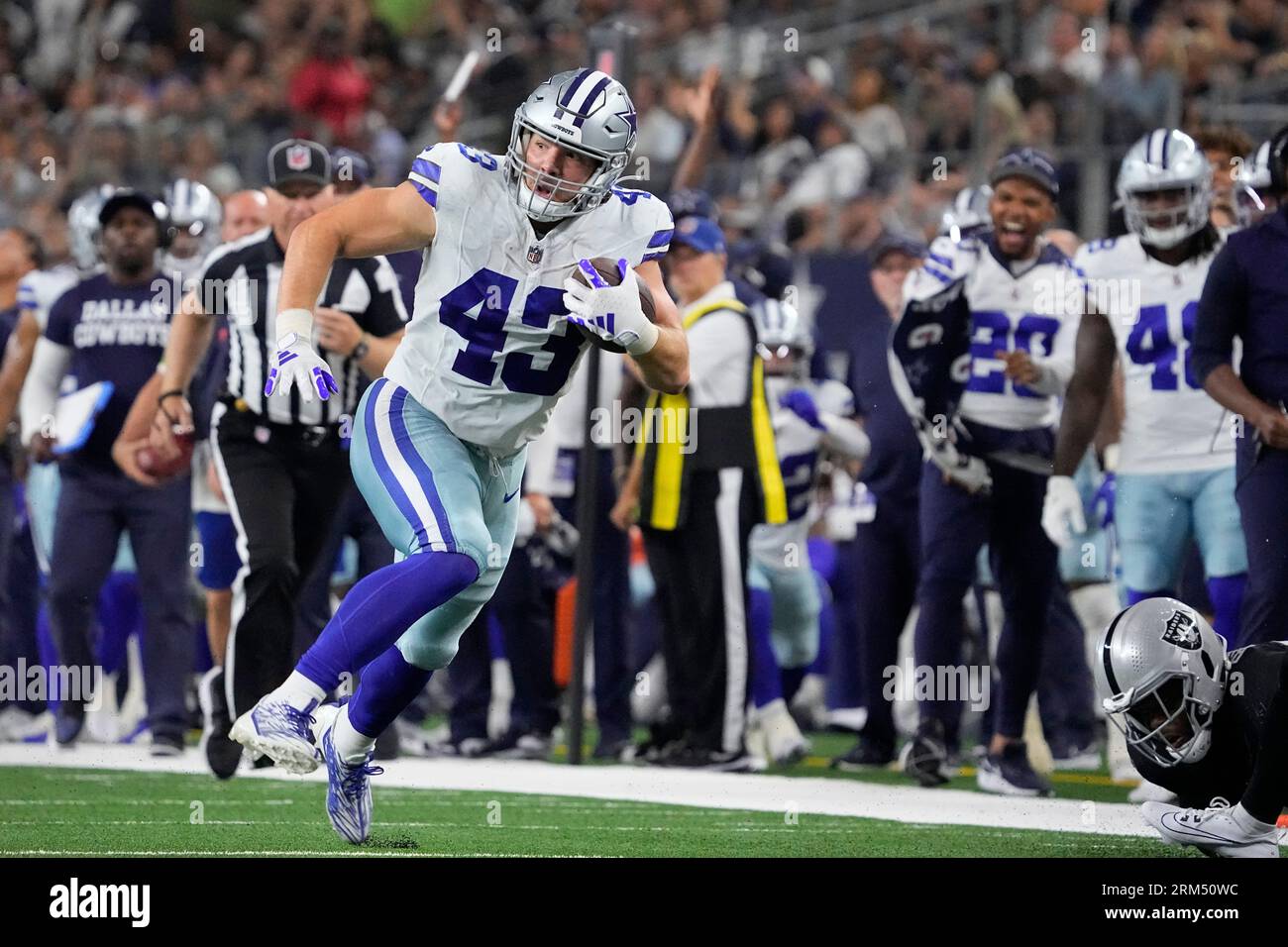 Dallas Cowboys running back Hunter Luepke sprints to the end zone ...
